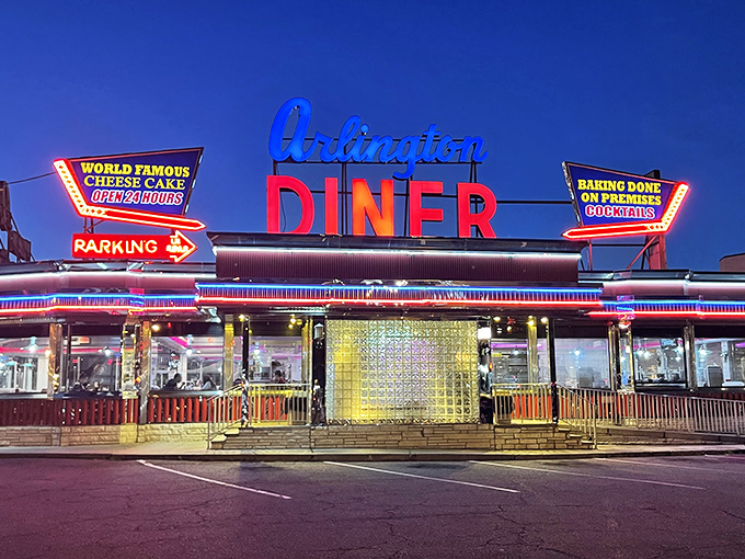Neon dreams come true! The Arlington Diner's retro sign beckons like a lighthouse for the hungry, promising comfort in a sea of late-night cravings.