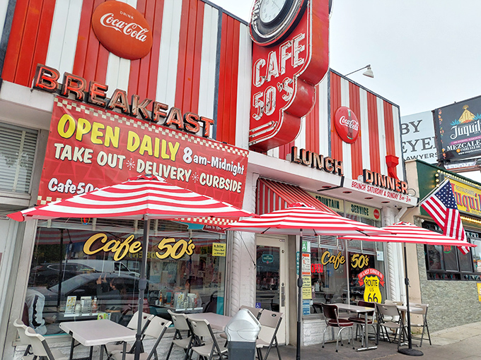 Step into a time warp! Cafe 50's exterior is a red-and-white striped wonderland that'll make you wonder if your DeLorean just hit 88 mph.