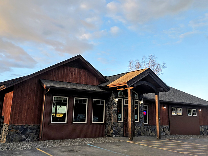 The rustic charm of The Flats Bistro's exterior feels like a warm Alaskan hug &ndash; part mountain lodge, part culinary hideaway, all inviting.