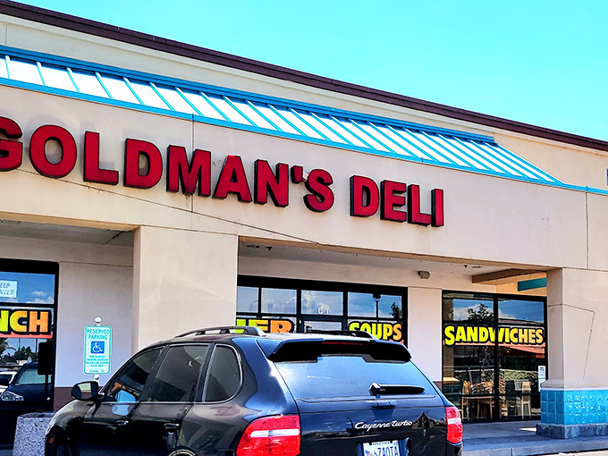 Welcome to sandwich paradise! Goldman's Deli stands proud, its neon sign a beacon for hungry souls seeking deli nirvana.