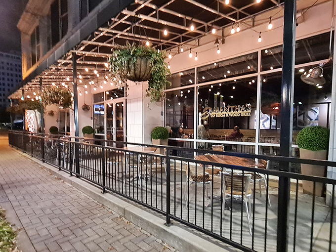Twilight transforms Samantha's patio into an urban oasis. The string lights and lush greenery create the perfect backdrop for that "I need to Instagram this" moment.