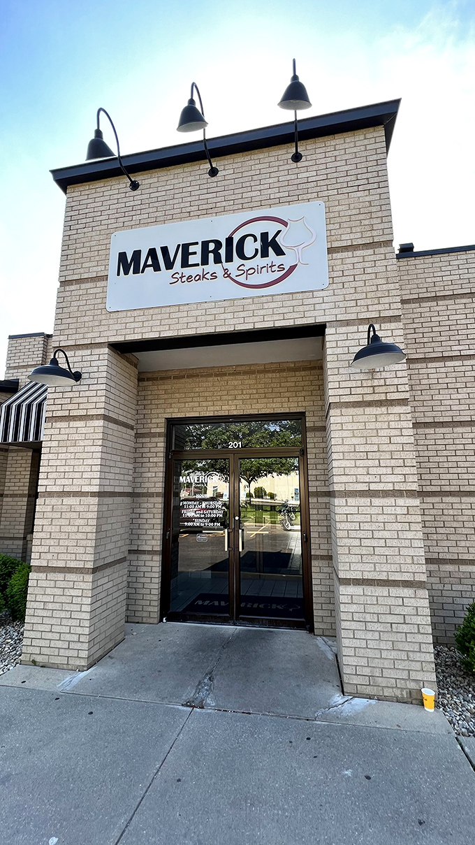 Welcome to Maverick Steaks & Spirits, where the exterior is as inviting as a warm hug from your favorite aunt. This brick facade promises meaty delights within!