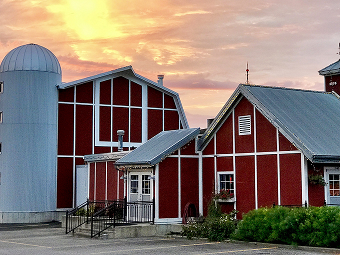 A barn-raising good time! Jimmy Jack's exterior promises a feast with its charming red siding and iconic white silo. It's like a Norman Rockwell painting come to life, but with better ribs.