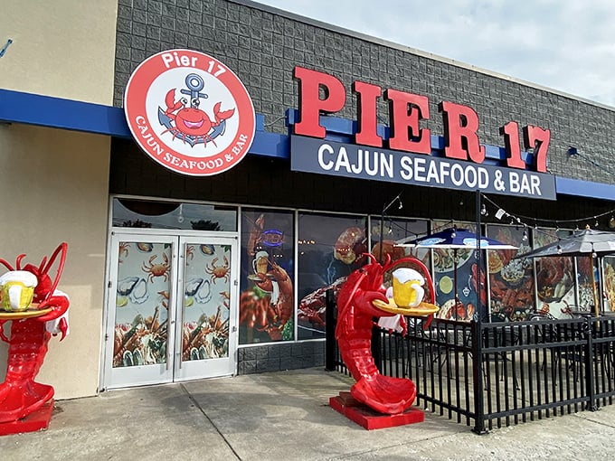 Welcome to Pier 17, where giant lobsters stand guard like crimson sentinels. It's as if Neptune himself decided to open a seafood joint in Kentucky!