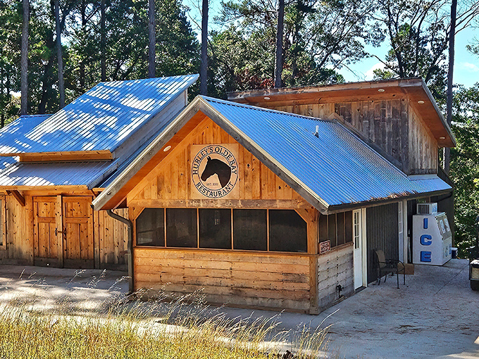 Welcome to Hurley's Olde Bay Restaurant, where rustic charm meets mouthwatering flavors. This wooden wonder looks like it could star in its own country music video!