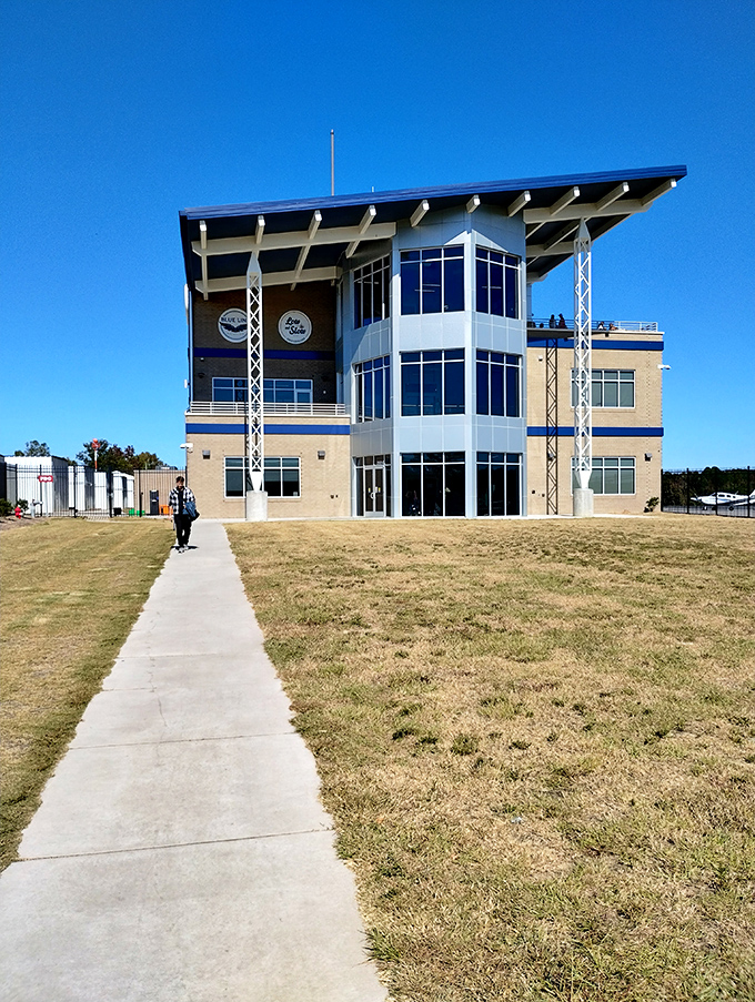 Welcome to barbecue paradise! This modern smokehouse looks like it could host a TED Talk on the art of slow-cooked perfection.