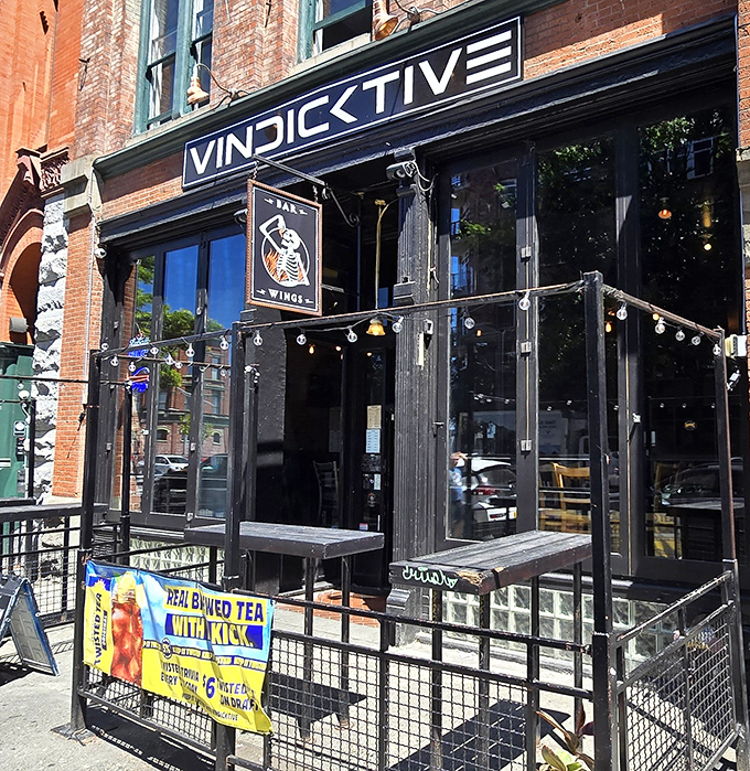 Welcome to flavor paradise! Vindicktive's brick facade hides a world of wing wonders, where napkins tremble and taste buds rejoice.