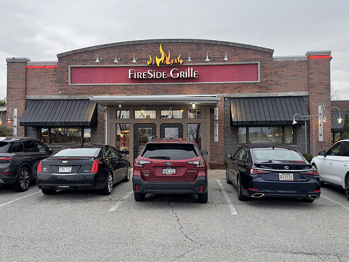 The brick facade with its flame-adorned sign promises warmth before you even step inside. FireSide Grille doesn't need neon to announce its culinary treasures.