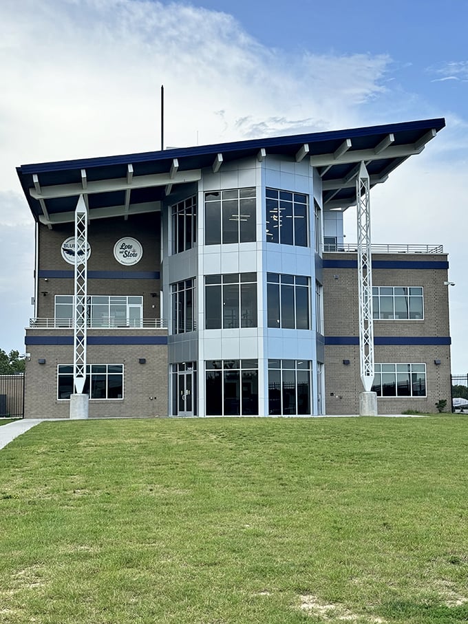 Welcome to barbecue paradise! This modern smokehouse looks like it could host a TED Talk on the art of slow-cooked perfection.