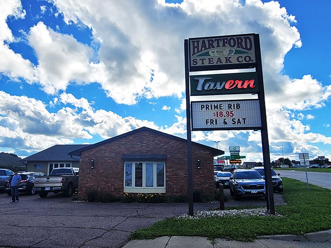 A beacon of beefy bliss! Hartford Steak Co. Tavern's sign promises prime rib that'll make your taste buds do a happy dance. Weekend plans: sorted.