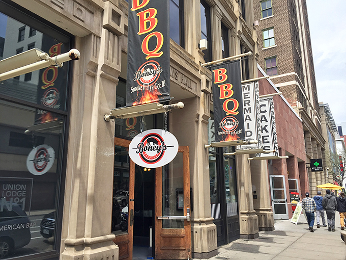 "Smoke signals in the city!" Boney's Smokehouse BBQ beckons meat lovers with its bold signage, promising a flavor-packed journey through barbecue bliss in the heart of Denver.