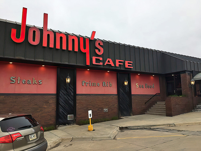 A neon beacon in the night, Johnny's Cafe stands ready to satisfy your carnivorous cravings. This isn't just dinner; it's a pilgrimage for prime rib devotees.