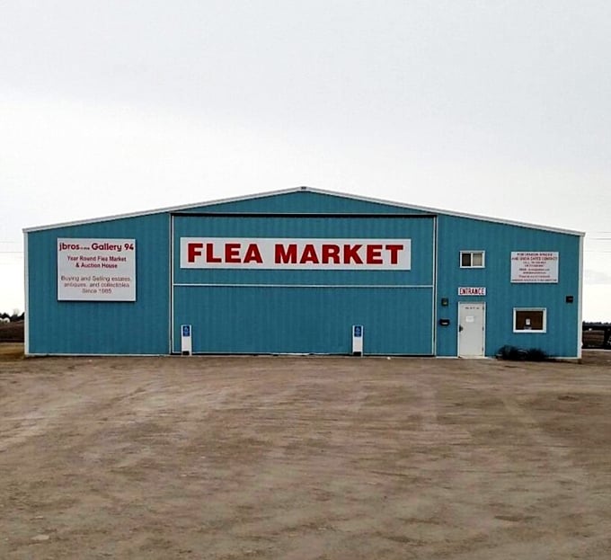 Welcome to the blue behemoth of bargains! JBros-n-Me Gallery 94 stands proud, a teal titan beckoning treasure hunters from far and wide.