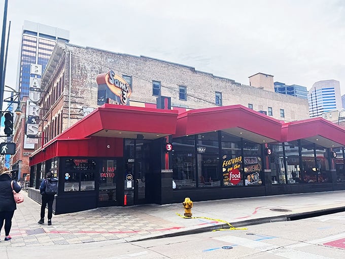A beacon of culinary delight! Sam's No. 3 stands proud, its red awning a siren call to hungry souls seeking breakfast nirvana.