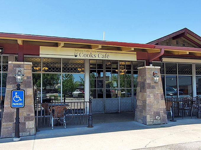 A stone-faced welcome that promises delicious secrets within. Cooks Cafe's exterior is like the world's tastiest fortress, guarding breakfast treasures.