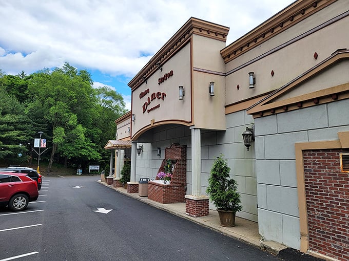 Welcome to flavor town! The Clinton Station Diner's exterior promises a journey through time and taste, with classic charm that'll make your stomach growl.