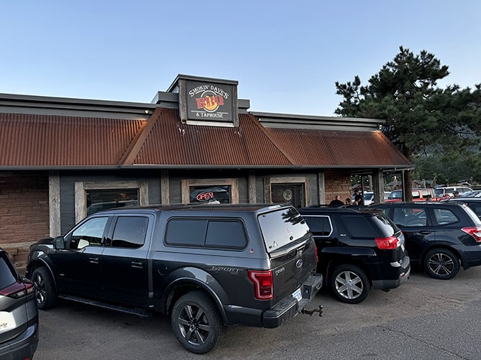 Welcome to BBQ paradise! Smokin' Dave's rustic exterior promises a feast for the senses, with cars lining up like eager diners at a backyard cookout.