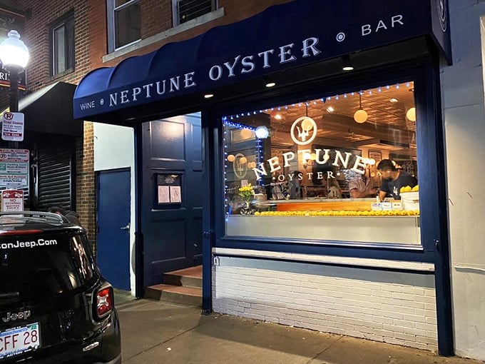 Neptune's siren call: A navy awning beckons seafood lovers into a world where oysters reign supreme and calories fear to tread.