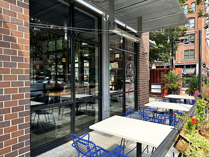 A coastal oasis in the heart of Omaha! Plank Seafood Provisions' inviting exterior promises a nautical adventure, complete with blue chairs that practically whisper "sit here and stay awhile."