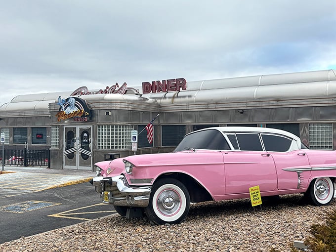 Step back in time! Rosie's Diner gleams like a chrome-plated dream, with a pink Cadillac that's more dolled up than Barbie's convertible.