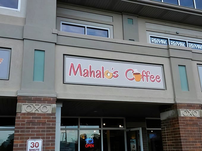 Welcome to flavor paradise! Mahalo's Coffee sign beckons like a tropical oasis in the heart of Iowa.