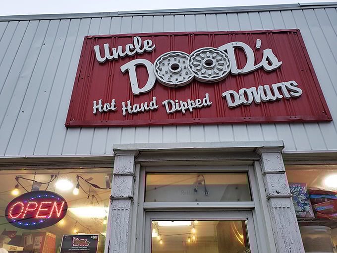 Welcome to donut paradise! Uncle Dood's sign promises hand-dipped delights that'll make your taste buds do a happy dance.