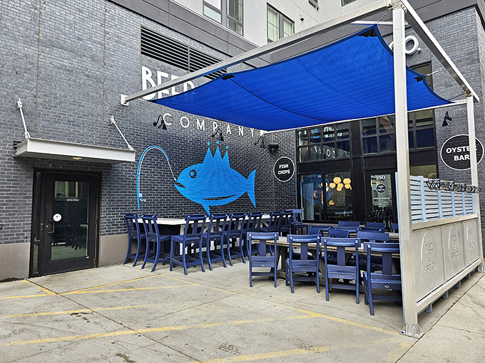 A seafood oasis in the heart of Fargo! Beer & Fish Company's vibrant blue awning and playful fish logo beckon like a siren's call to landlocked seafood lovers.