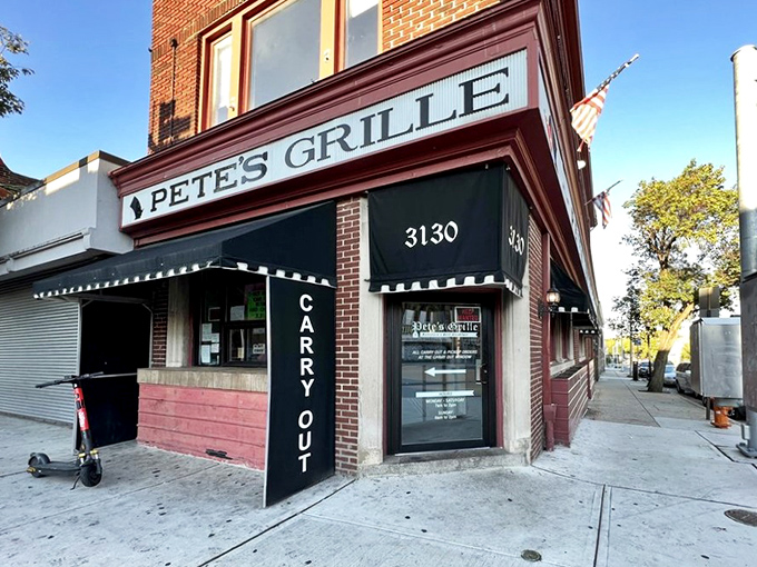 A beacon of breakfast bliss! Pete's Grille stands proud on the corner, its maroon awning a siren call to hungry Baltimoreans seeking their morning fix.