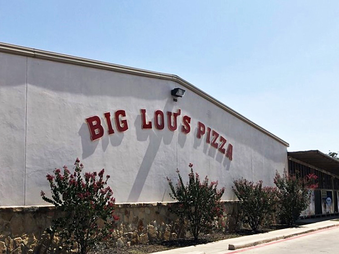 Welcome to pizza paradise! Big Lou's exterior may be unassuming, but inside lies a world of cheesy wonders waiting to be discovered.