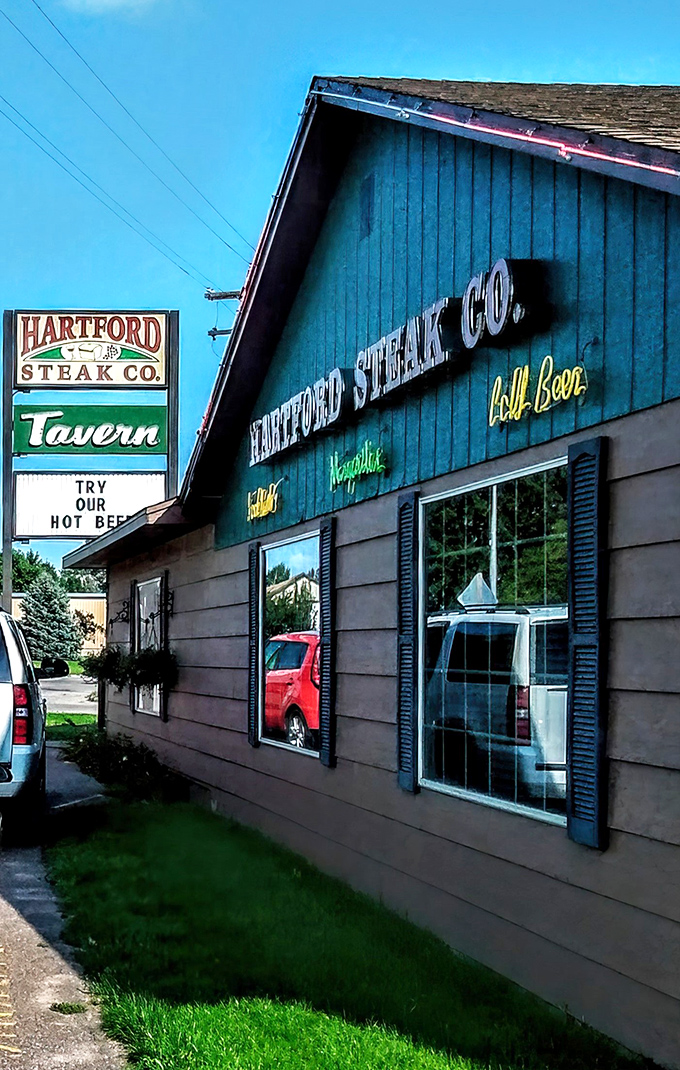 A beacon of beefy bliss! Hartford Steak Co. Tavern's sign promises prime rib that'll make your taste buds do a happy dance. Weekend plans: sorted.
