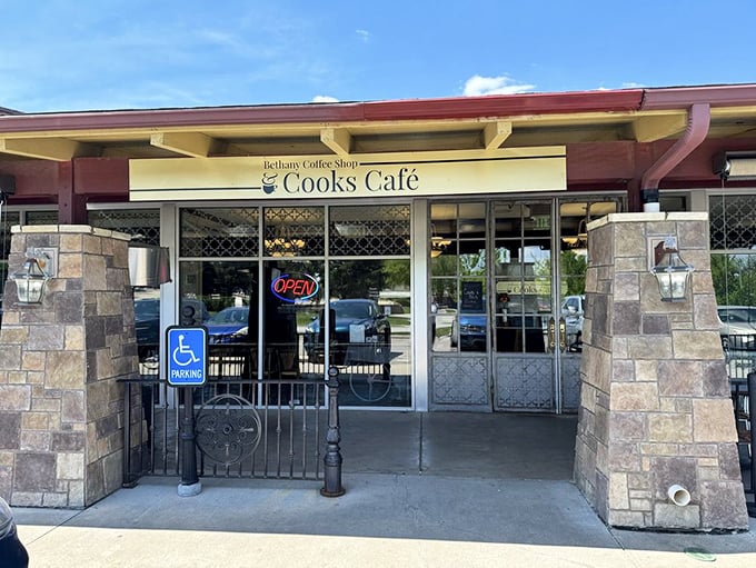 A stone-faced welcome that promises delicious secrets within. Cooks Cafe's exterior is like the world's tastiest fortress, guarding breakfast treasures.