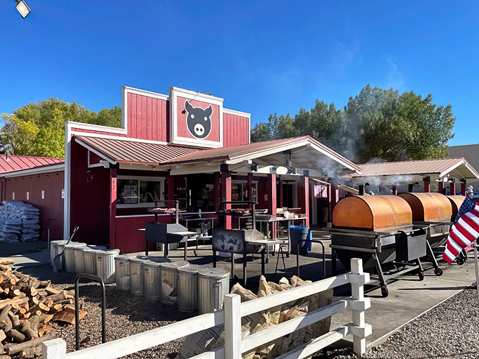 Welcome to BBQ paradise! Copper Top BBQ's charming exterior promises smoky delights and mountain views that'll make your taste buds sing and your Instagram followers drool.