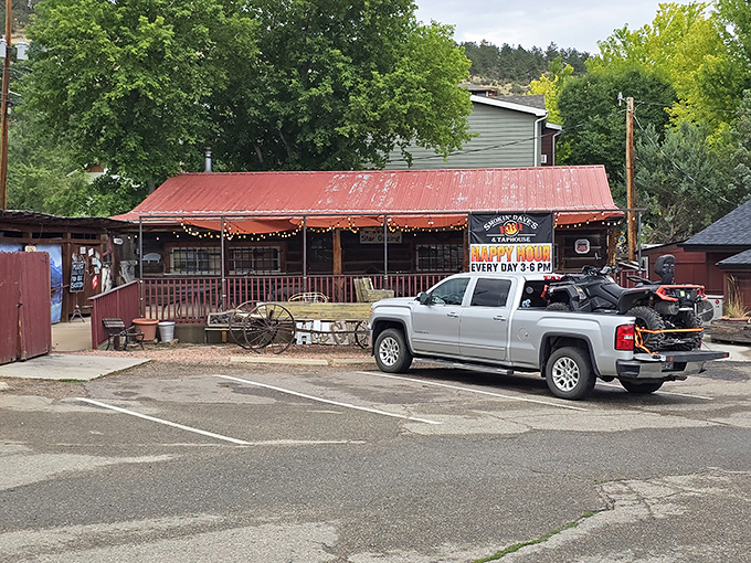 The rustic red-roofed exterior of Smokin' Dave's beckons like a barbecue beacon in Estes Park. Happy hour every day? Count me in!