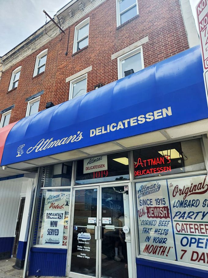 That iconic blue awning isn't just a sign&mdash;it's a beacon for sandwich lovers, promising a century-old tradition of deliciousness waiting inside.