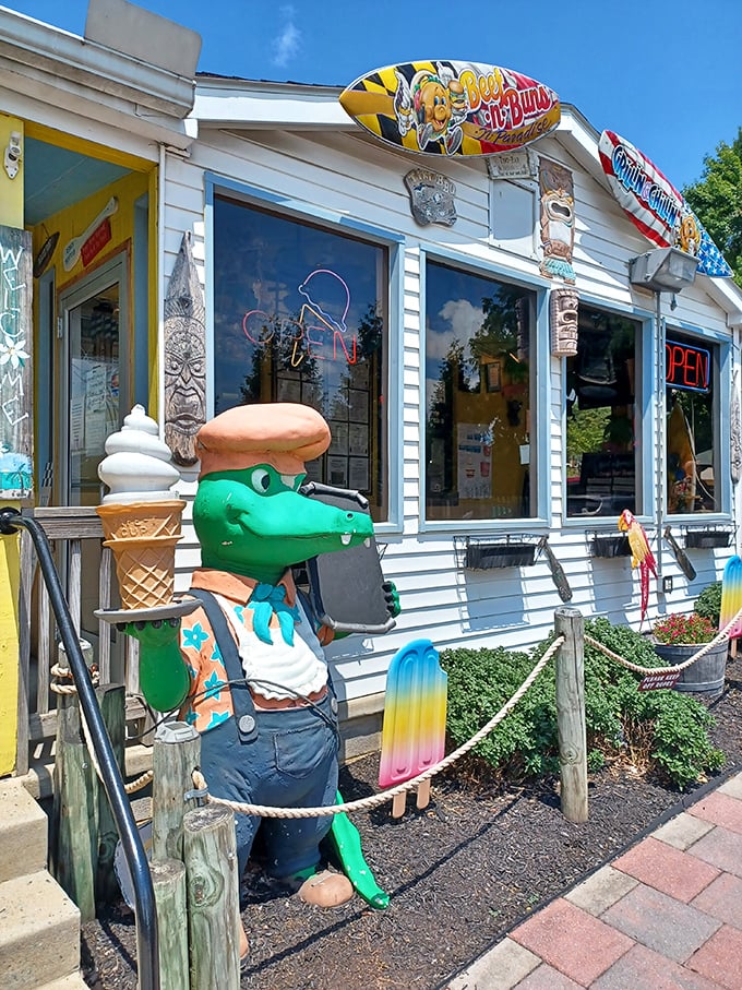 Welcome to flavor town! Beef 'n Buns 'n Paradise looks like it washed up from a Jimmy Buffett song, complete with surfboards and a friendly gator greeter.