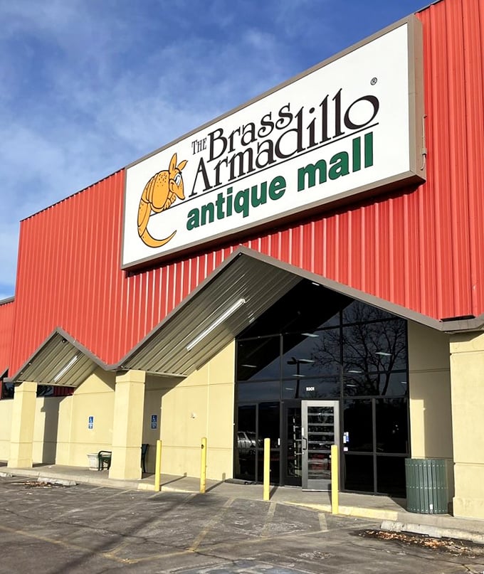 Welcome to the Brass Armadillo, where the exterior is as bold as the treasures inside. This red behemoth stands ready to transport you through time, one antique at a time.