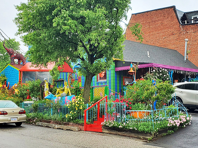 Step into a Technicolor dream! PaperMoon Diner's patio is a kaleidoscope of colors, where even the 'TOMATOES' sign seems to be winking at you.