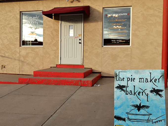 Welcome to pie paradise! The Pie Maker Bakery's charming exterior promises a world of flaky, fruity delights waiting just beyond that red-trimmed door.