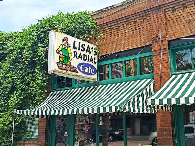A beacon of breakfast bliss! Lisa's Radial Cafe's charming exterior promises a feast for the senses, with its jolly chef sign beckoning hungry patrons like a culinary Pied Piper.