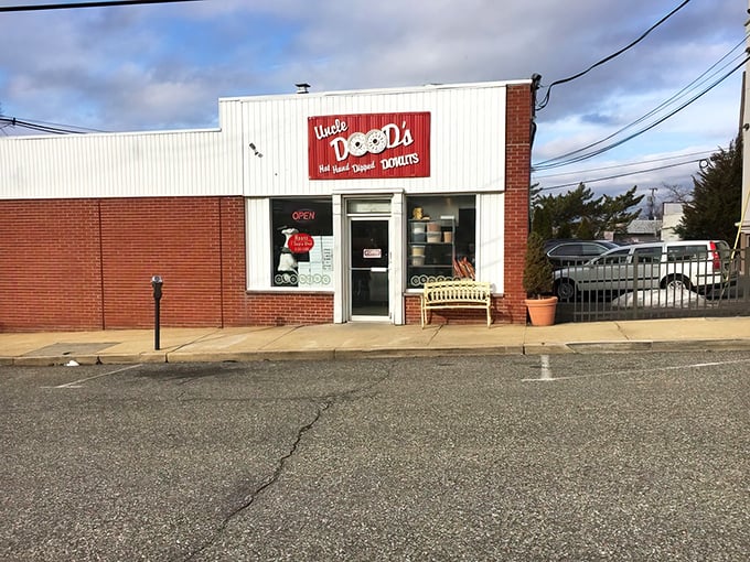 Welcome to donut paradise! Uncle Dood's sign promises hand-dipped delights that'll make your taste buds do a happy dance.