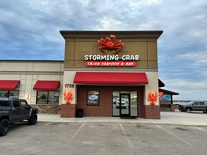 Ahoy, seafood lovers! This crab-tastic facade is like a lighthouse for hungry landlubbers, beckoning you to a feast that'll make you forget you're in South Dakota.
