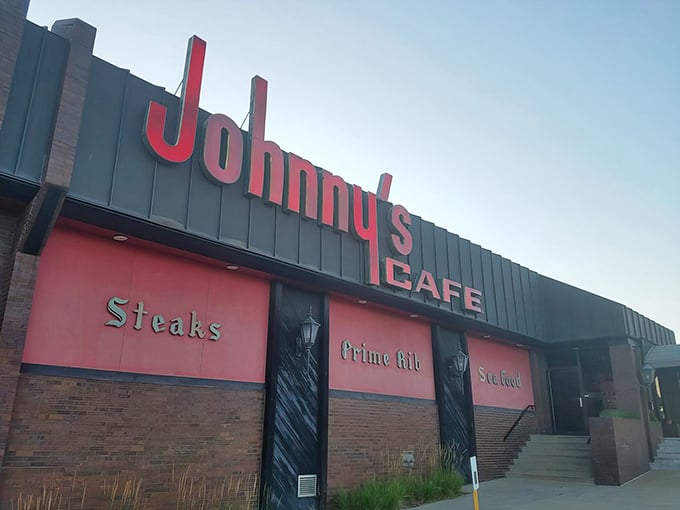 A neon beacon in the night, Johnny's Cafe stands ready to satisfy your carnivorous cravings. This isn't just dinner; it's a pilgrimage for prime rib devotees.