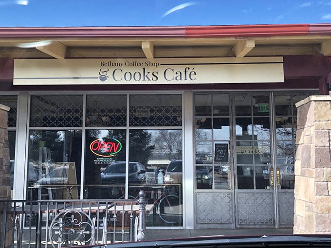 A stone-faced welcome that promises delicious secrets within. Cooks Cafe's exterior is like the world's tastiest fortress, guarding breakfast treasures.