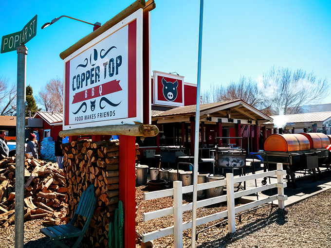 Welcome to BBQ paradise! Copper Top BBQ's charming exterior promises smoky delights and mountain views that'll make your taste buds sing and your Instagram followers drool.