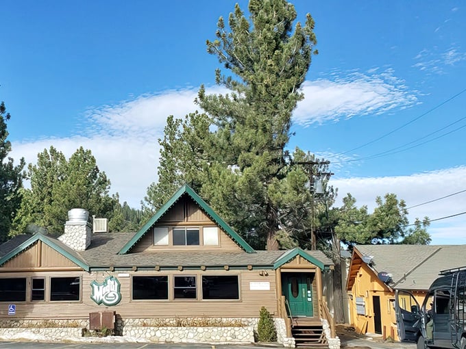 A cozy cabin in the woods? Nope, it's Mogul Restaurant, where comfort food dreams come true and mashed potato mountains await your conquest.