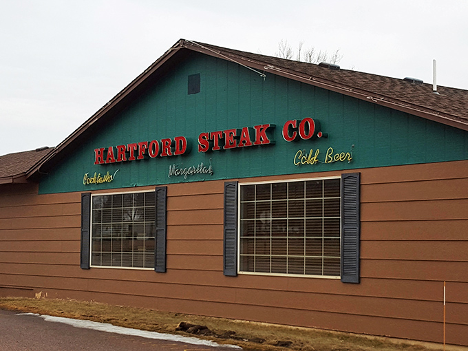 A beacon of beefy bliss! Hartford Steak Co. Tavern's sign promises prime rib that'll make your taste buds do a happy dance. Weekend plans: sorted.