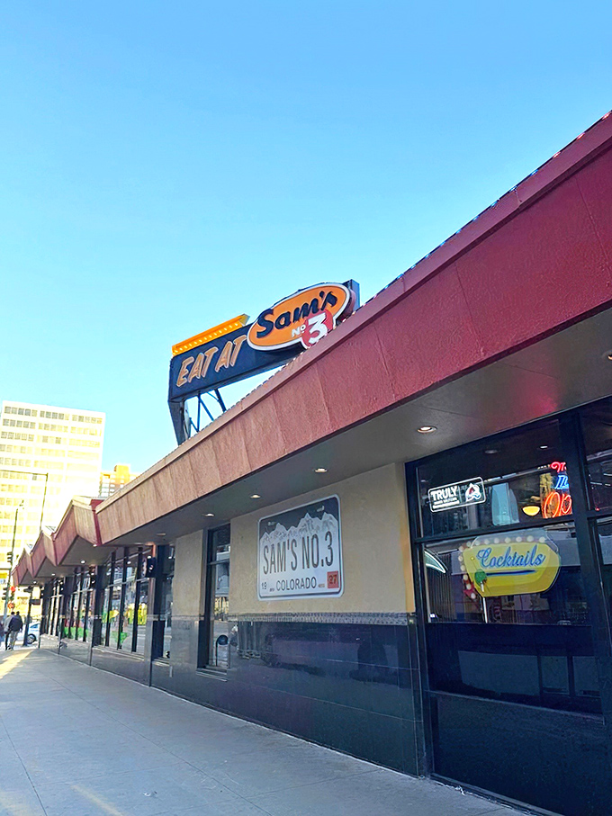 A beacon of culinary delight! Sam's No. 3 stands proud, its red awning a siren call to hungry souls seeking breakfast nirvana.