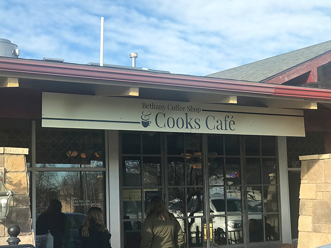 A stone-faced welcome that promises delicious secrets within. Cooks Cafe's exterior is like the world's tastiest fortress, guarding breakfast treasures.