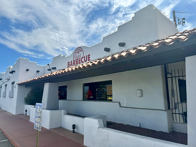 The white facade with that iconic red logo beckons like a barbecue lighthouse, guiding hungry souls to smoky salvation in Avondale.
