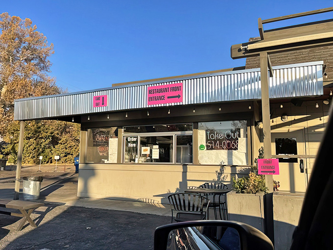 Don't judge this BBQ book by its cover! Behind that unassuming exterior and those bright pink signs lies a smoky paradise worth every carnivorous mile.